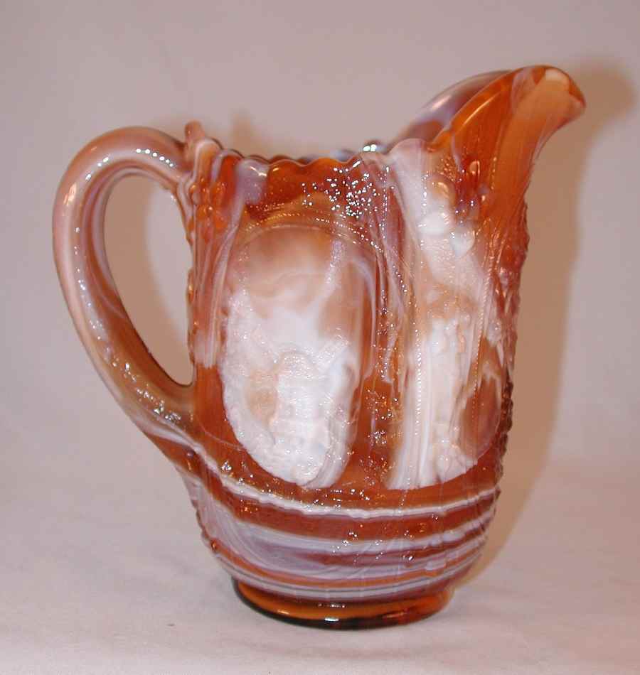 Vintage Caramel Colored Slag Glass Footed Pitcher with Raised Designs ...